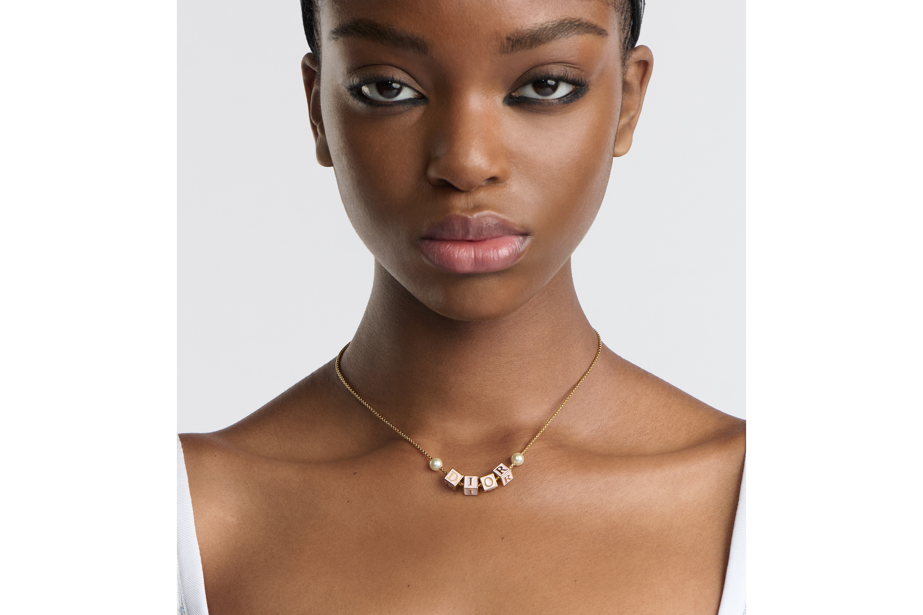 D-Dice Necklace Gold-Finish Metal with Pale Pink Lacquer and White ...